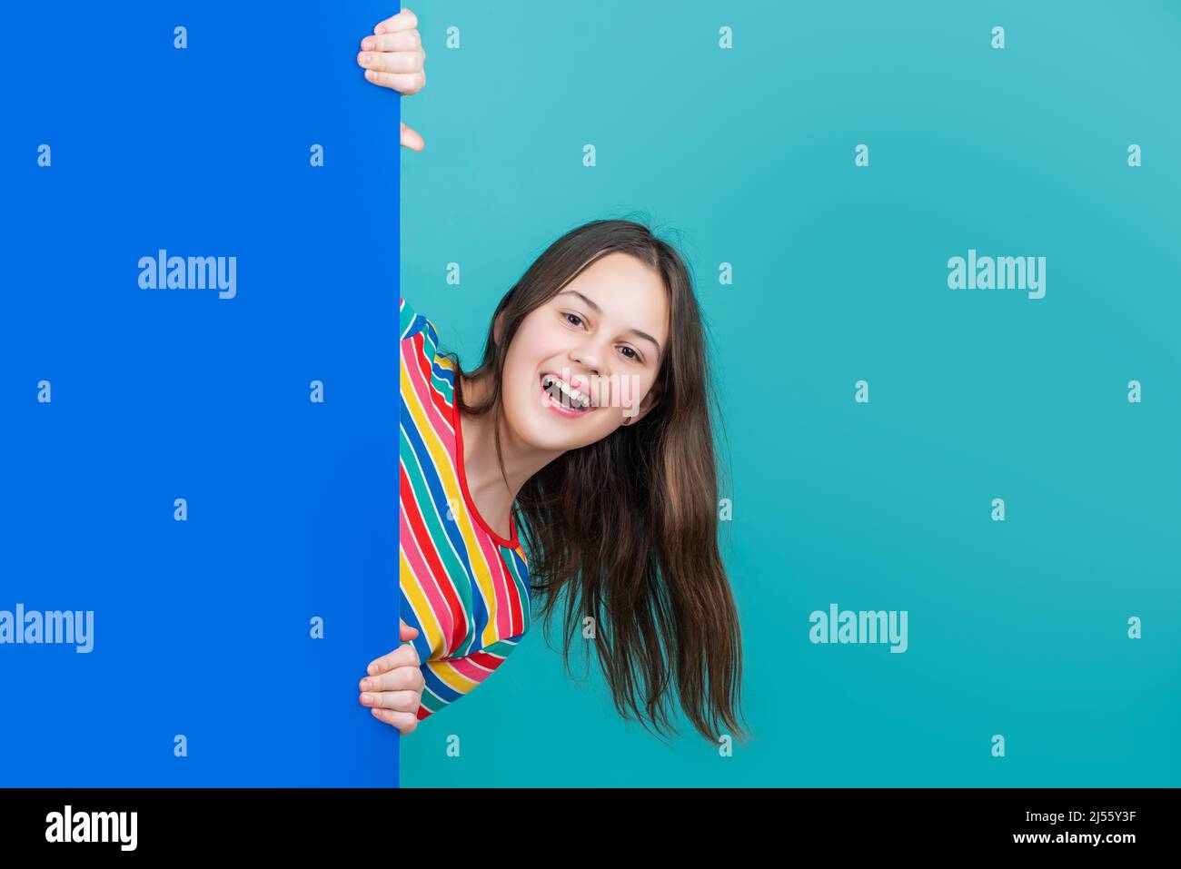 Laughing kid behind blank hi-res stock photography and images - Alamy