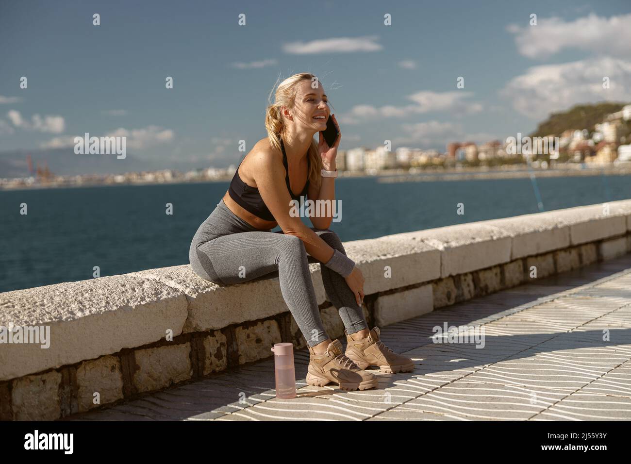 Young blonde woman engaged in hi-res stock photography and images - Alamy