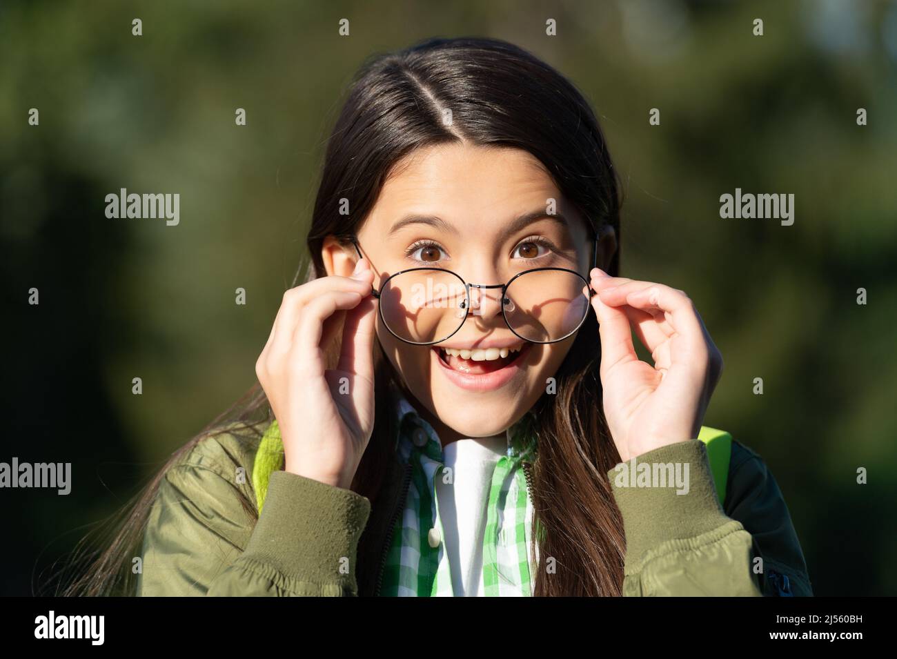 amazed kid with backpack wear glasses. back to school Stock Photo - Alamy