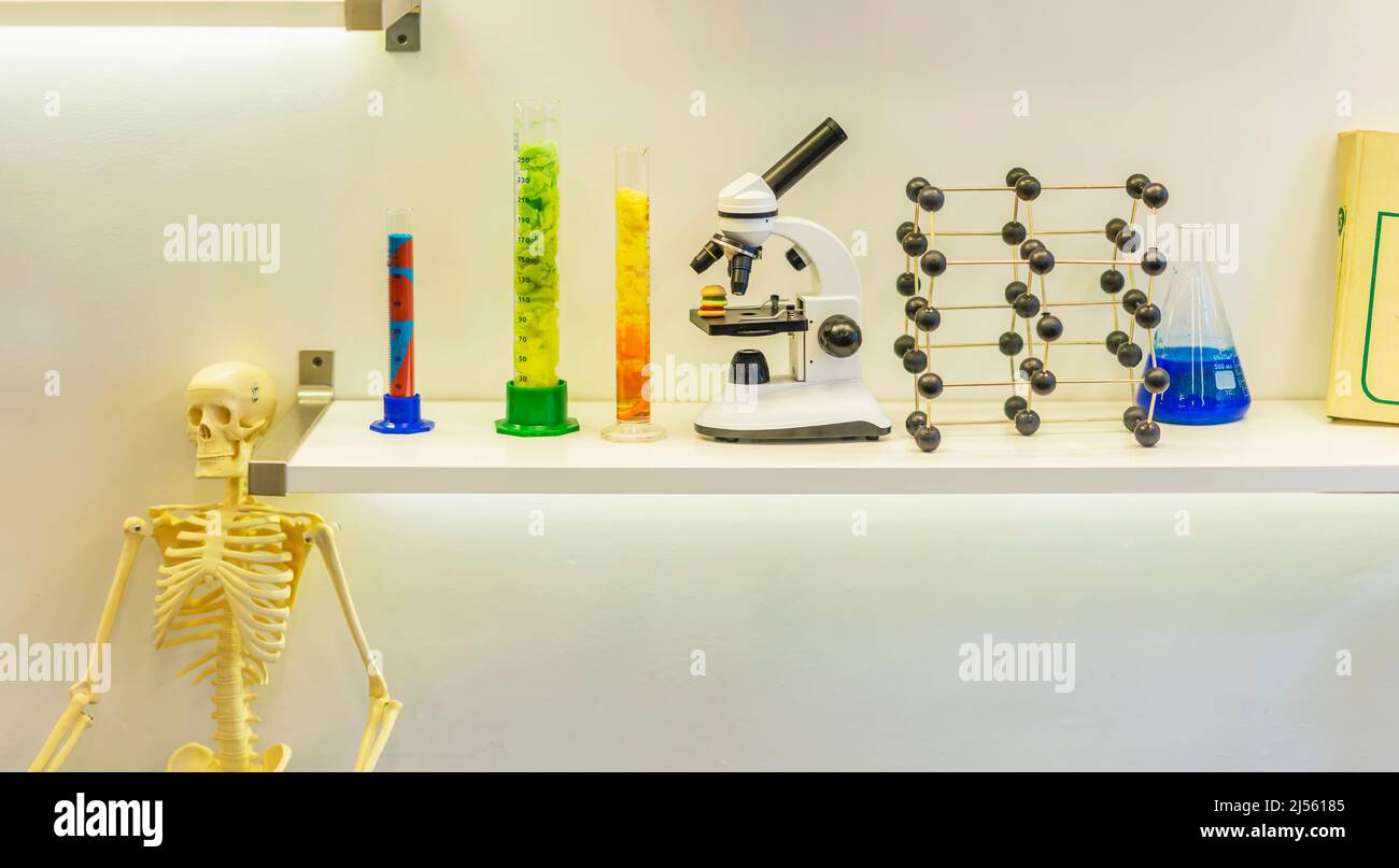 Chemistry science laboratory. Microscope, flask, beaker, test tubes ...