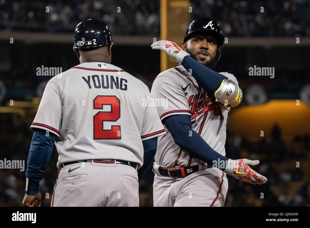 Atlanta Braves left fielder Marcell Ozuna (20) reacts after hitting a ...