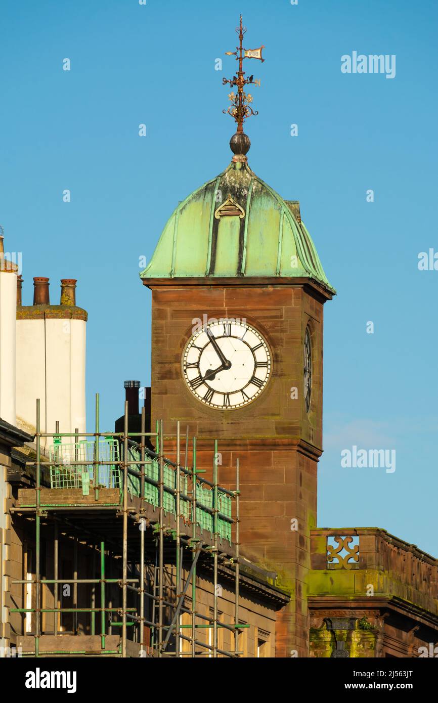 Beautiful old clock tower in English city on a sunny Spring morning ...