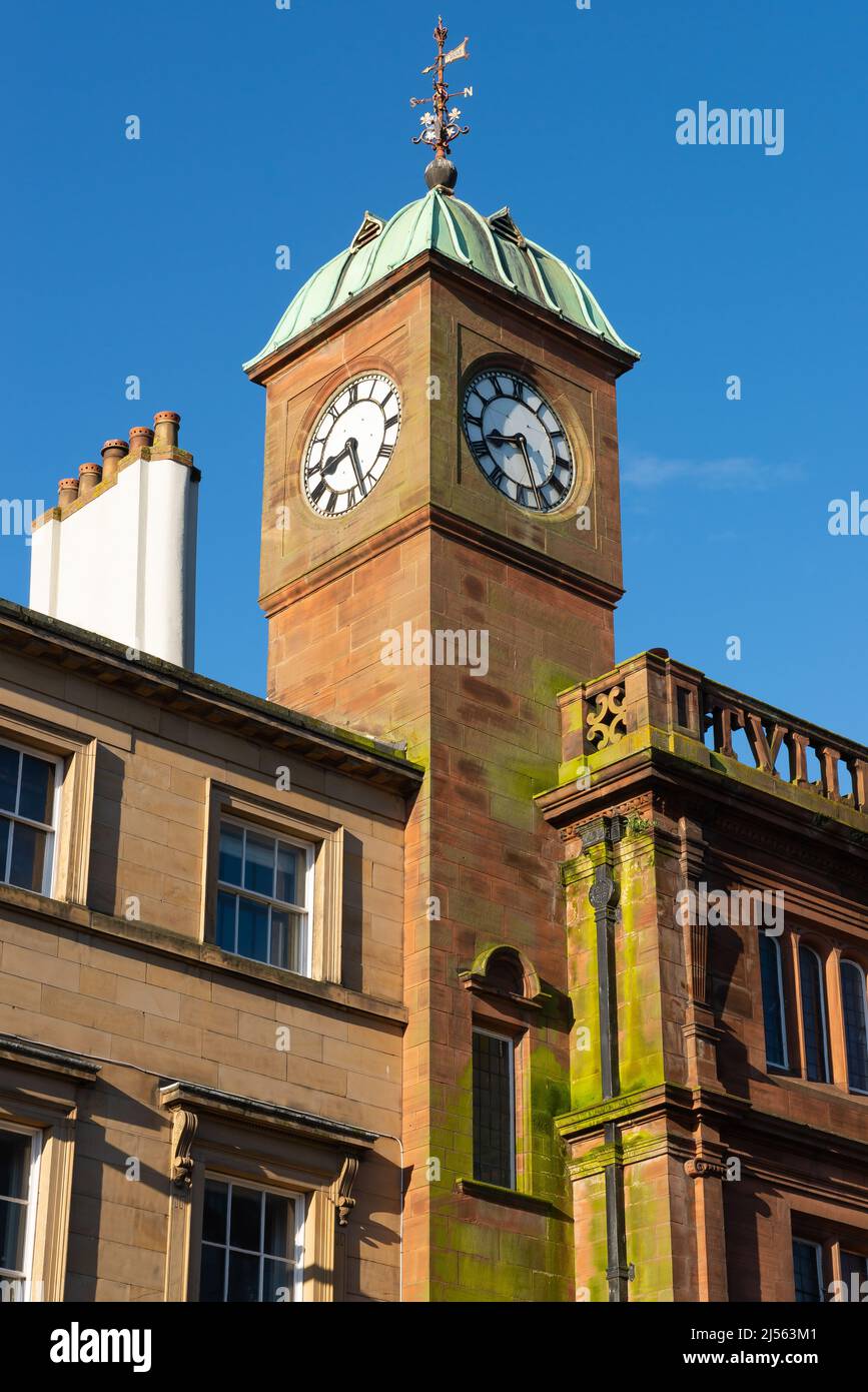 Beautiful old clock tower in English city on a sunny Spring morning ...