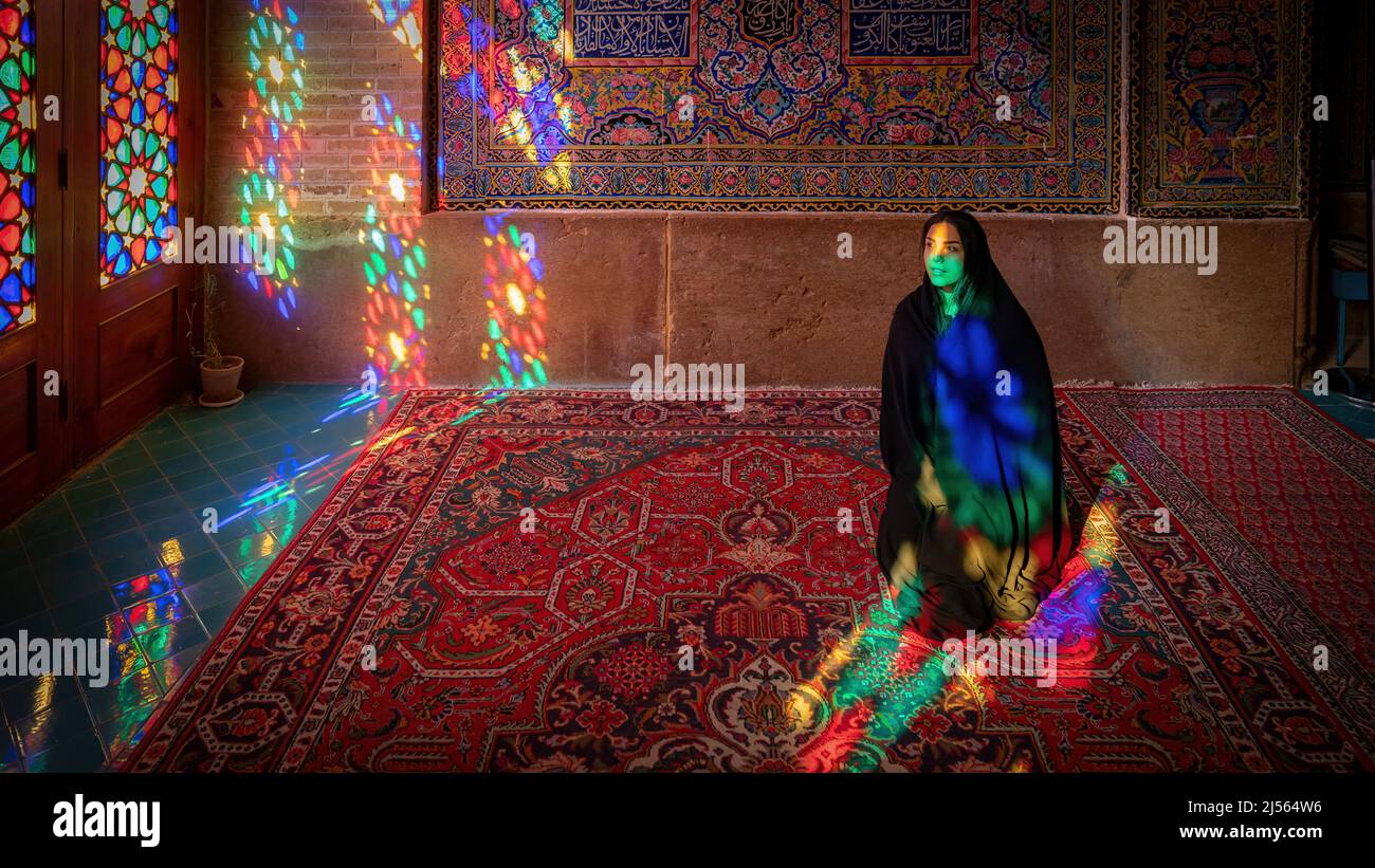 Iran, Shiraz - May 2019: Iranian woman inside with stained glass window ...