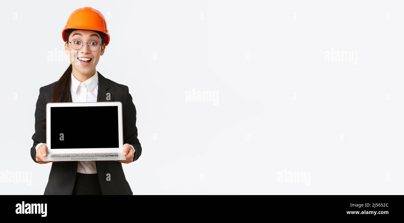 Excited happy asian female engineer, industrial manager in business ...