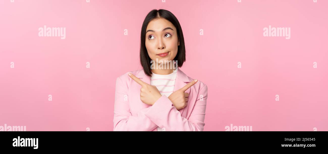 Decision concept. Young asian businesswoman, corporate worker pointing ...
