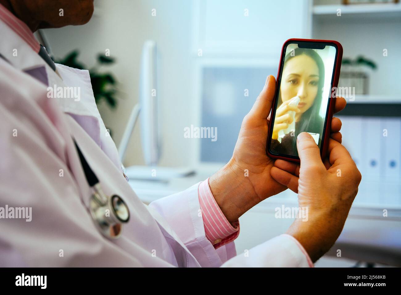 Using stethoscope healthcare professional examining hi-res stock ...