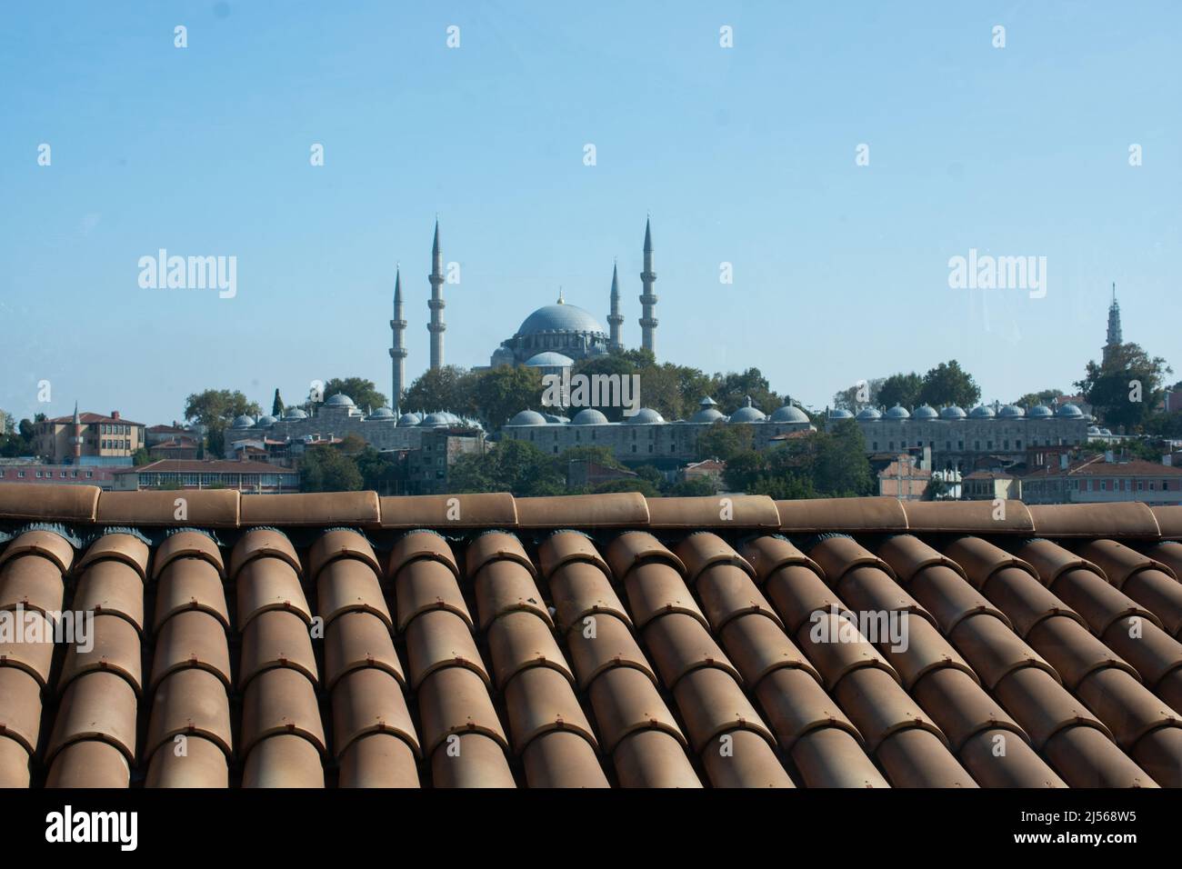 Dome and minaret of Masjid mosque in Ottoman architecture style Stock ...