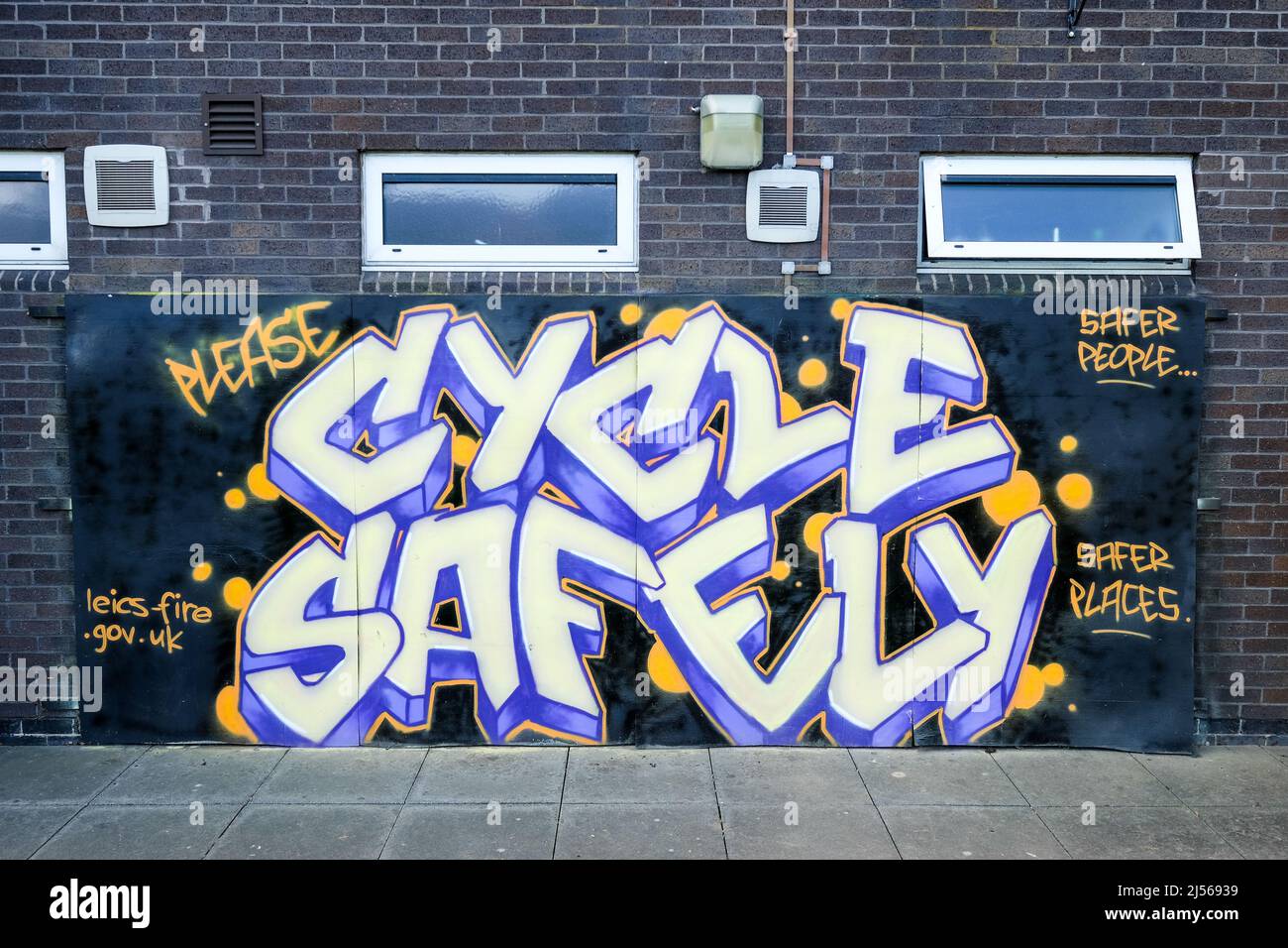 cycle safety message painted on board Stock Photo - Alamy