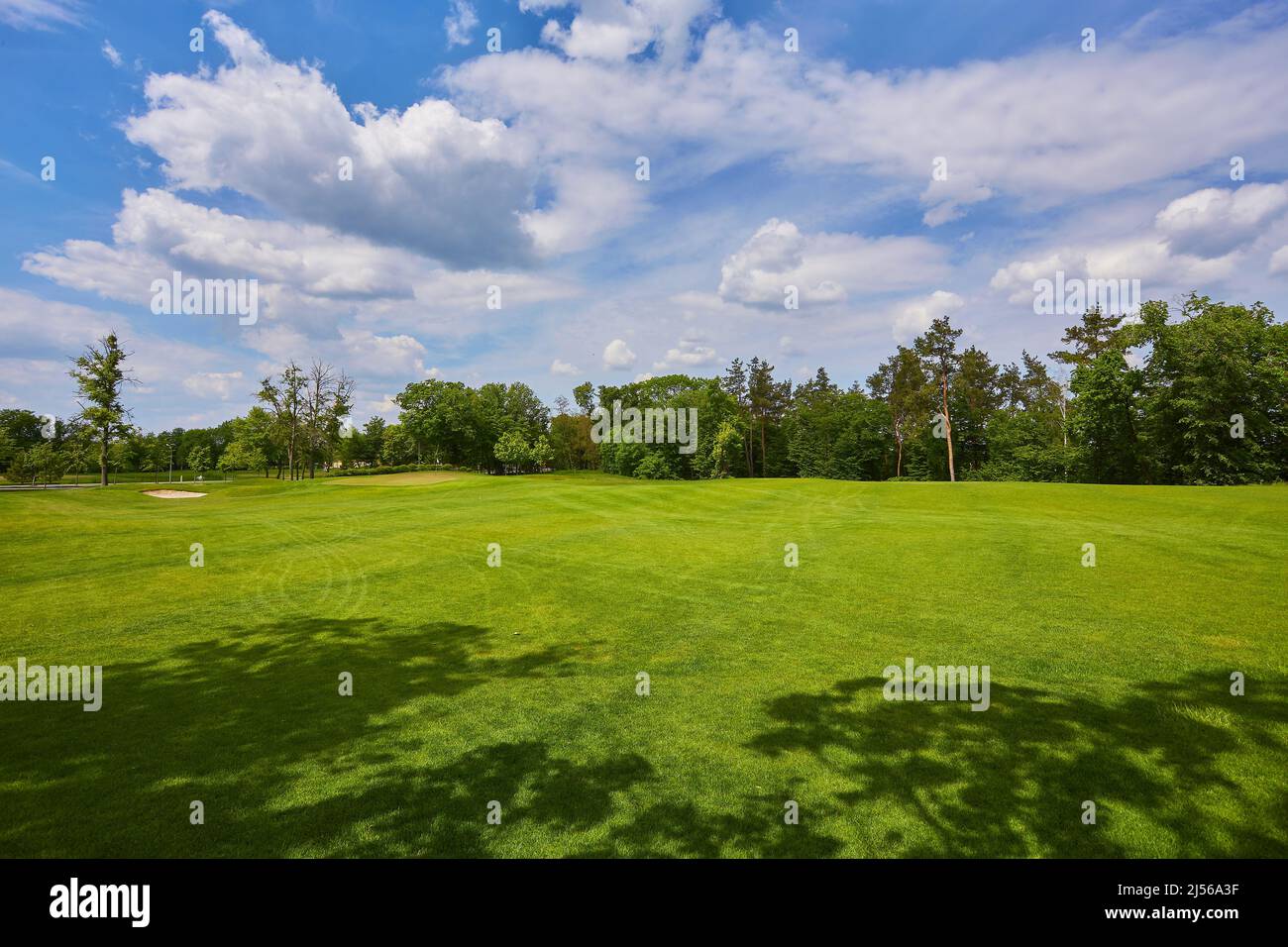 View of Golf Course with beautiful green field. Golf course with a rich ...