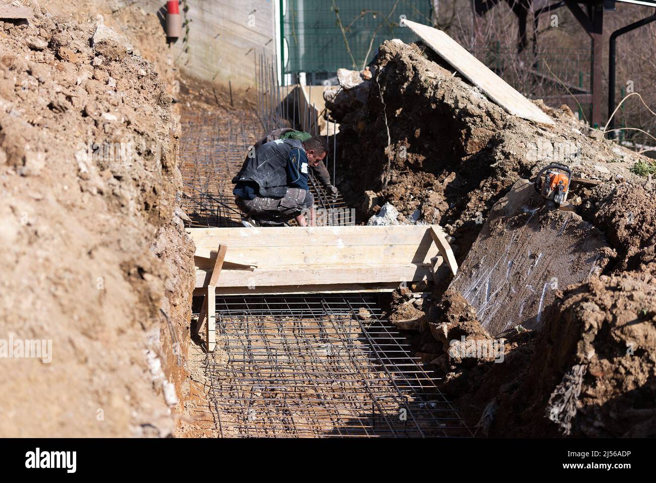 Construction workers fabricating steel reinforcement bar at the ...
