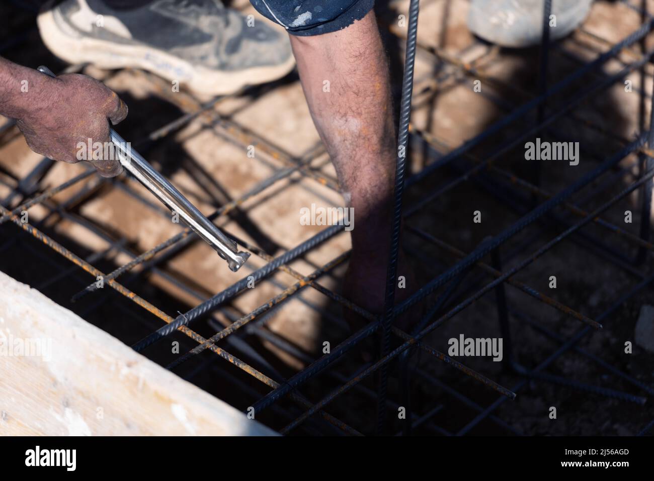 Construction workers fabricating steel reinforcement bar at the ...