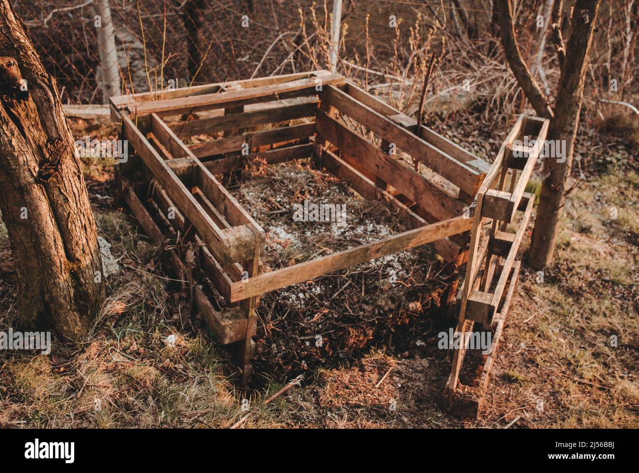 open euro pallet composter in garden with garden and kitchen leftovers ...