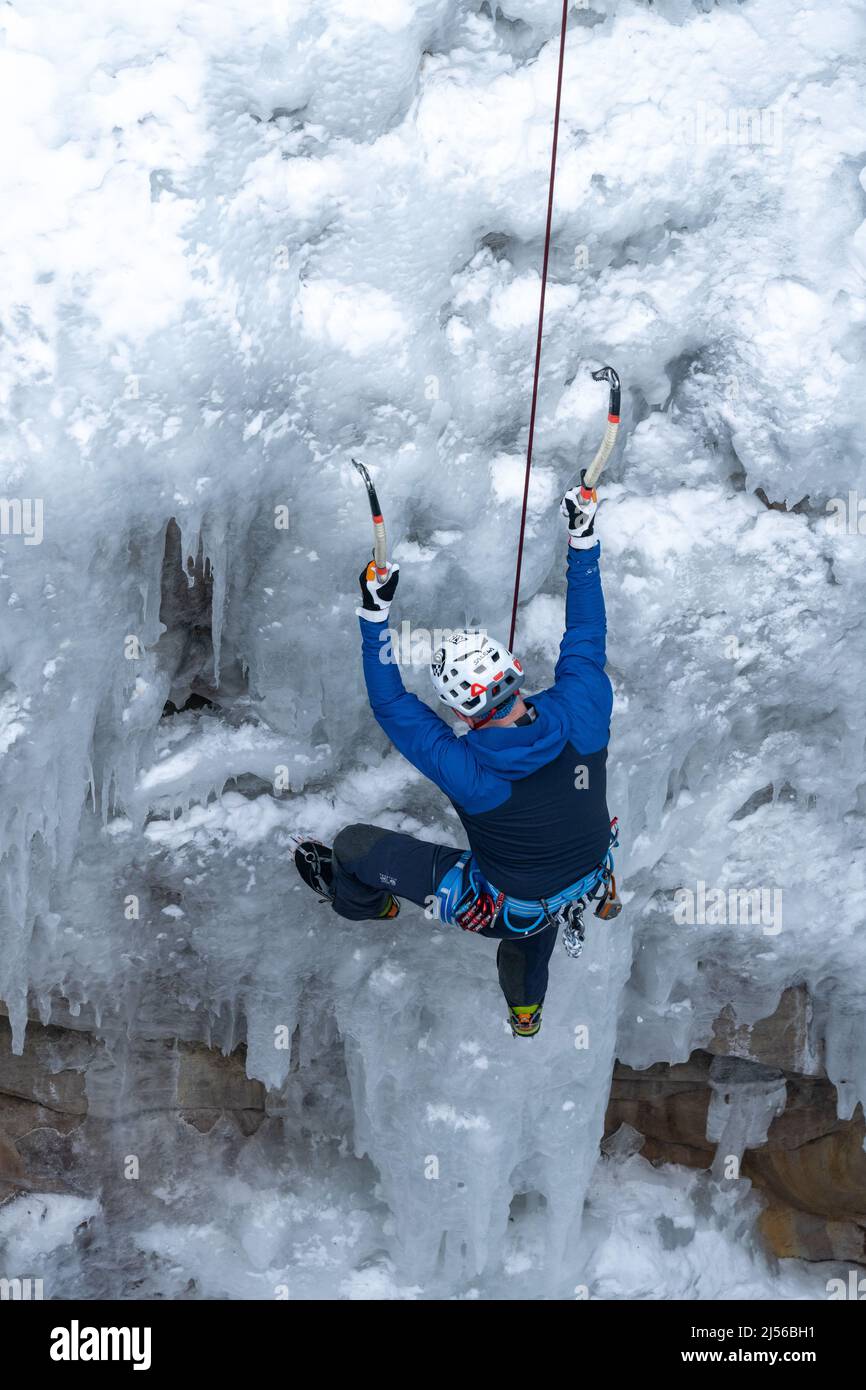 Overhead ice climber climbing frozen hi-res stock photography and ...