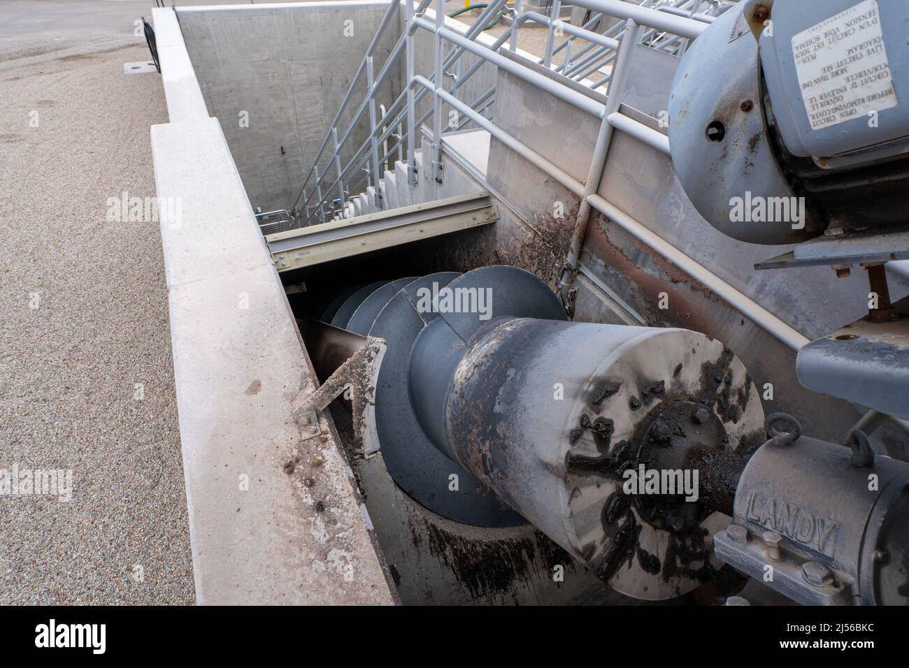 A large helical screw conveyor lifts sewage influent into an SBR or ...