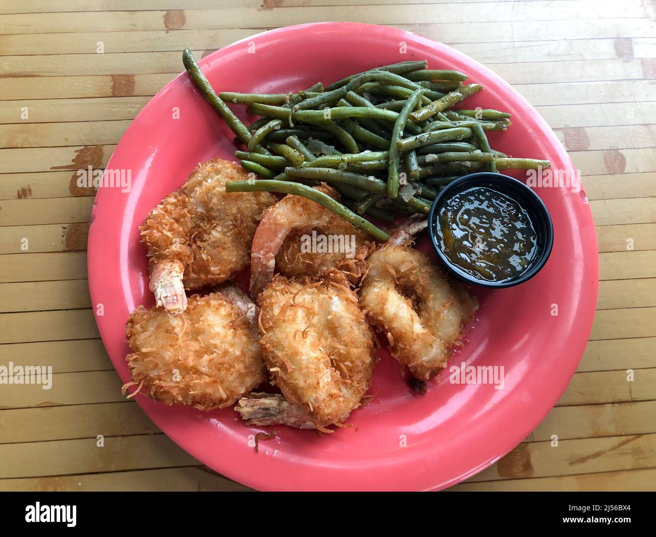 Fresh coconut-breaded Gulf shrimp and green beans at a restaurant in ...