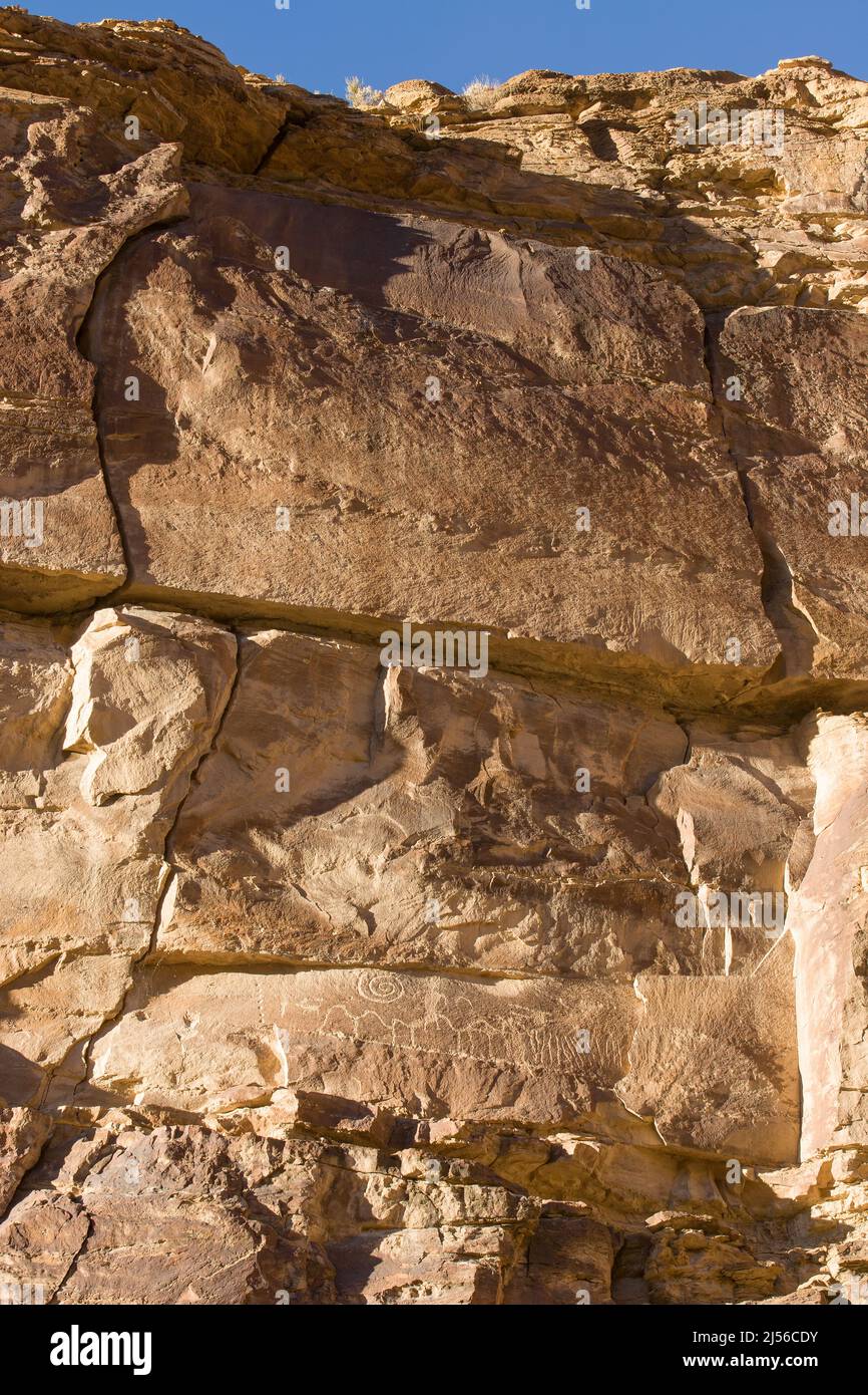 A Fremont-style petroglyph panel with spirals, wavy lines and an ...