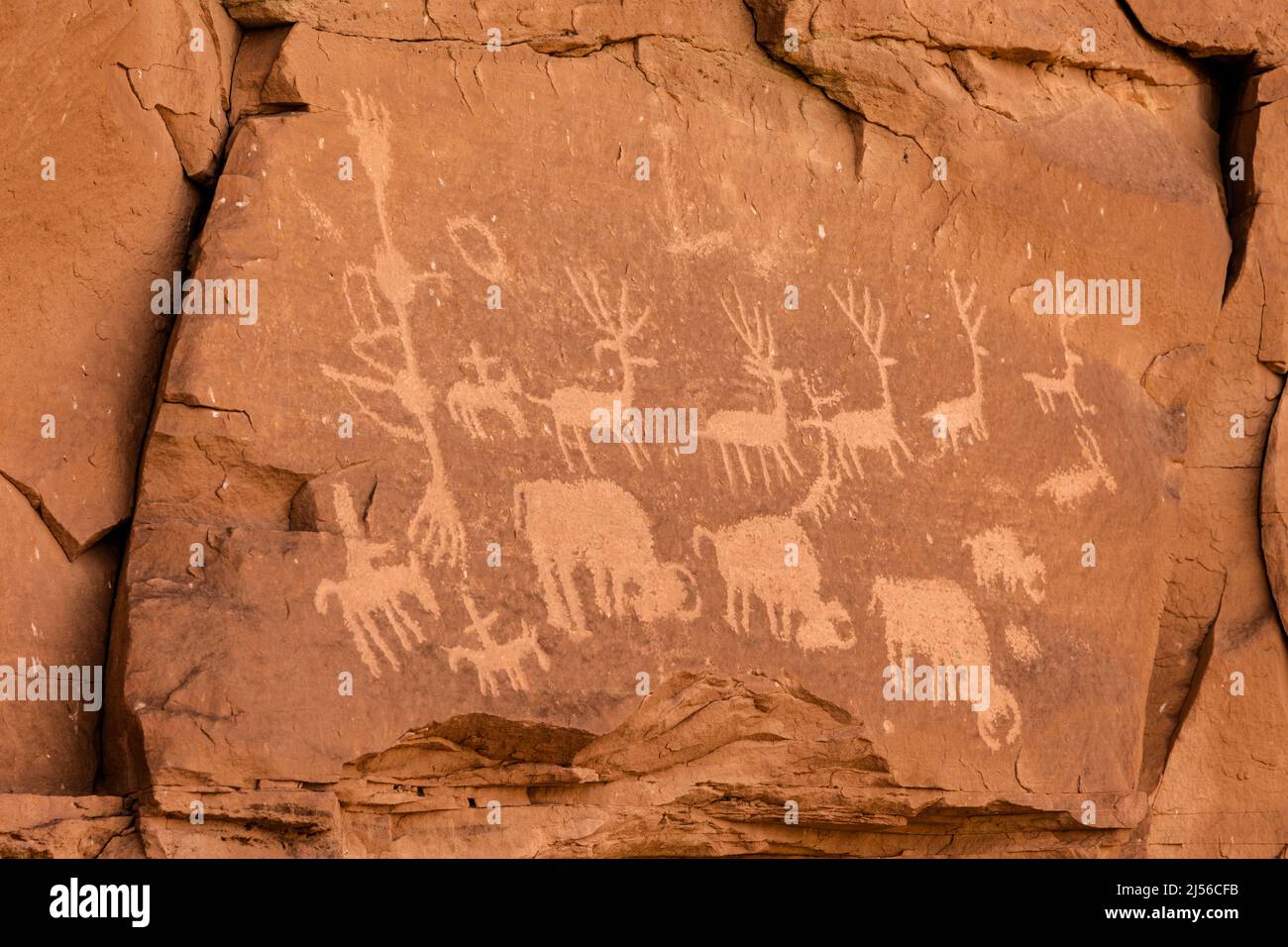 A Native American petroglyph or rock art on a sandstone cliff in ...