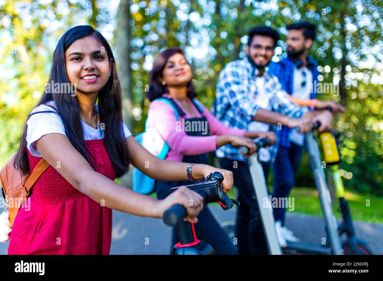 modern indian friends ride on segway in park in India Stock Photo - Alamy