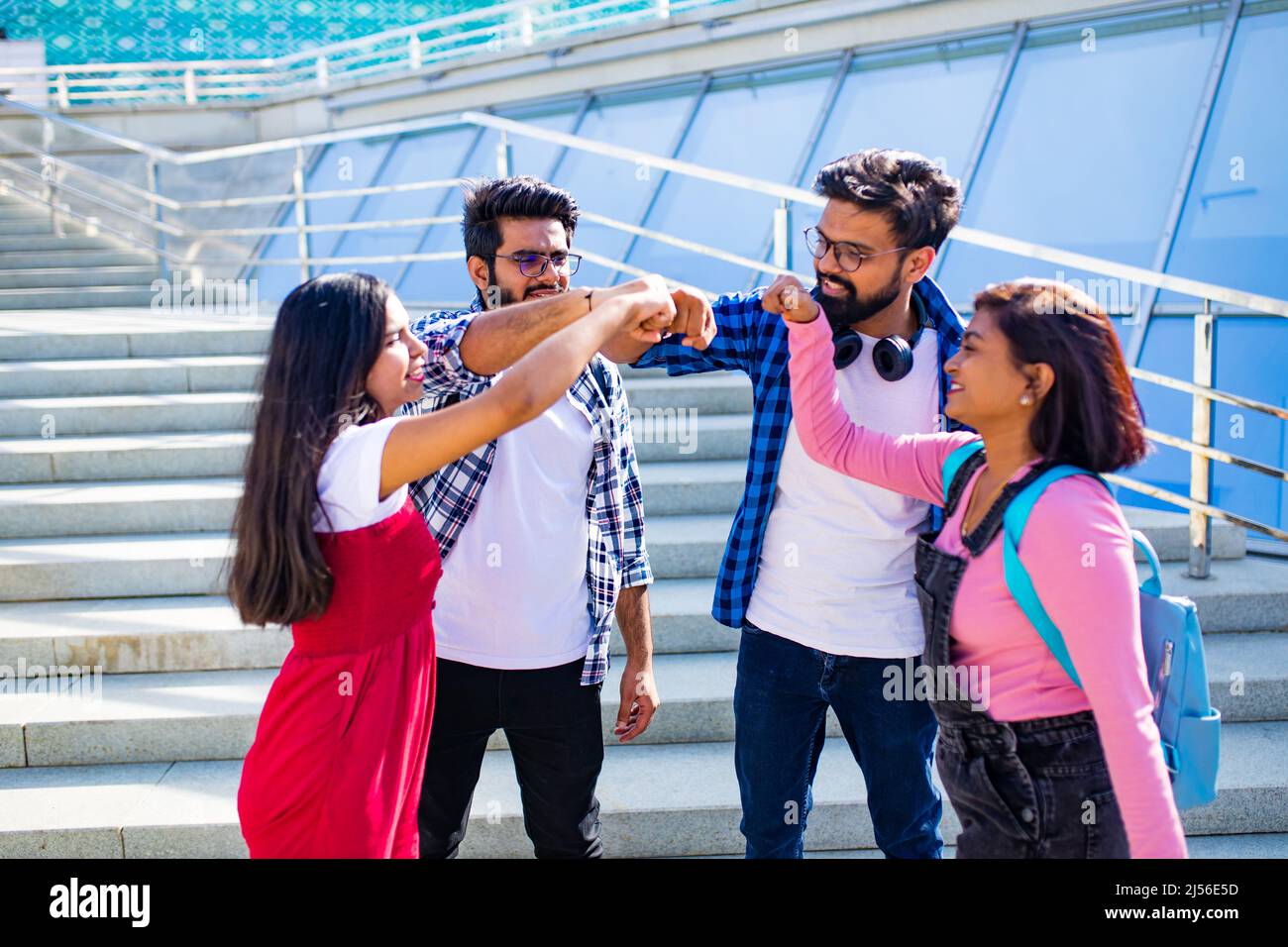 indian students keeping distance and do home work outdoors Stock Photo ...