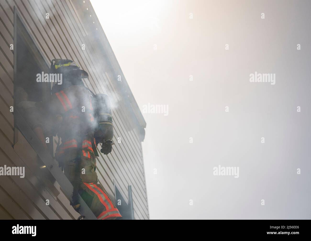 Firefighter entering building hi-res stock photography and images - Alamy