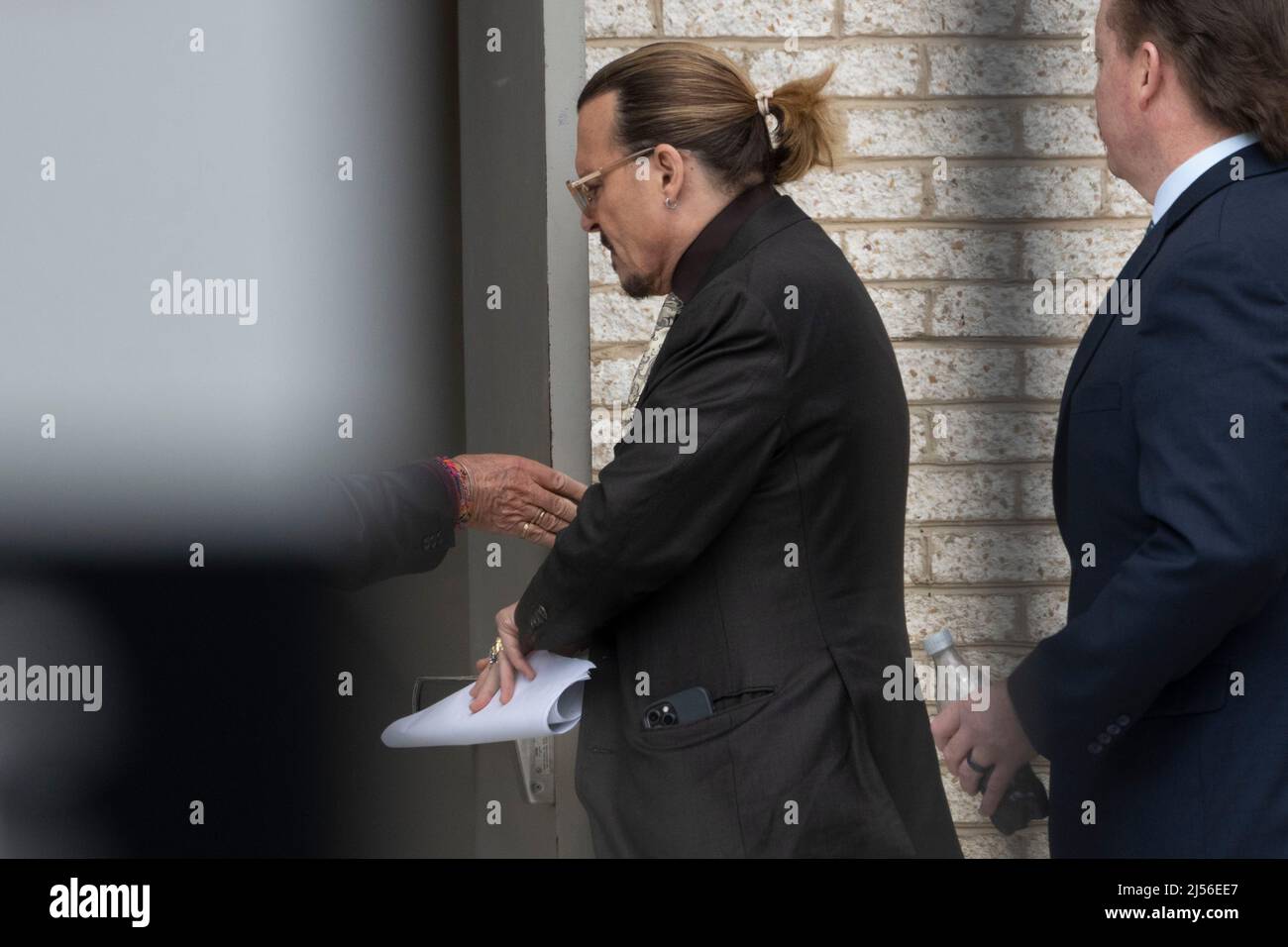 Actor Johnny Depp returns to the courtroom after taking a break from ...