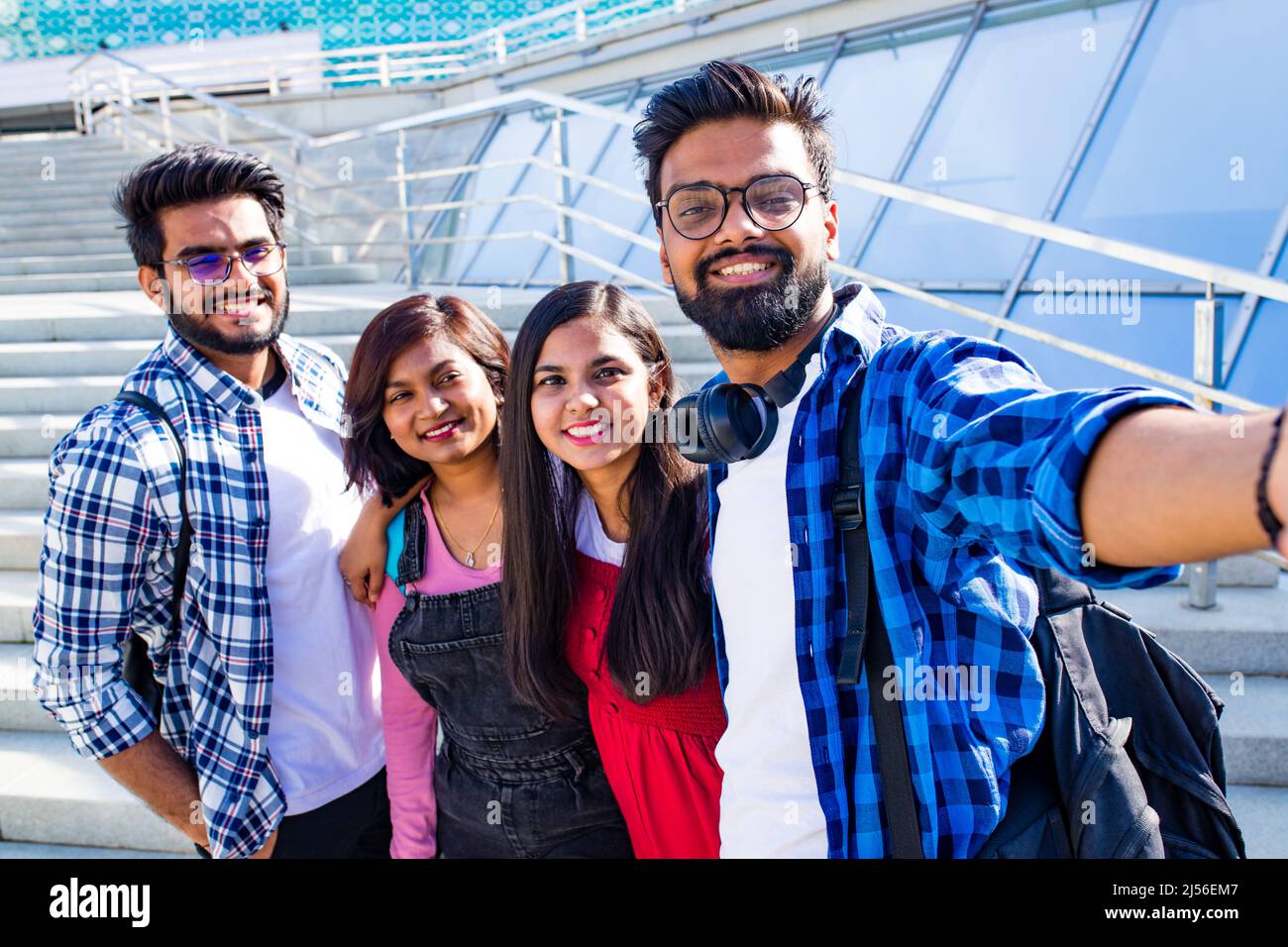 infian best friends spending time together outdoors in spring park ...