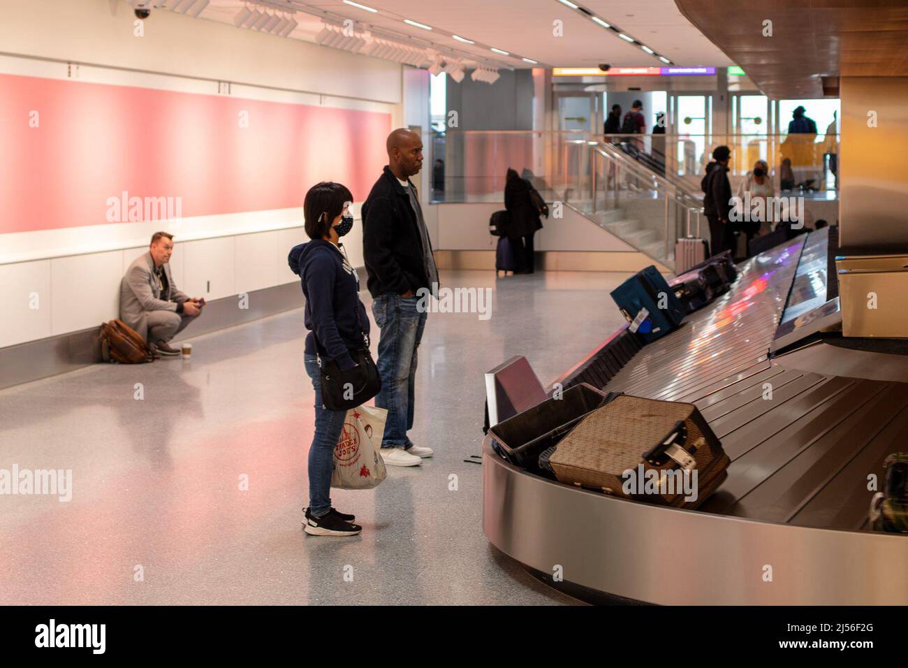 Los Angeles, CA April 20th: Delta customers wait for their luggage to ...