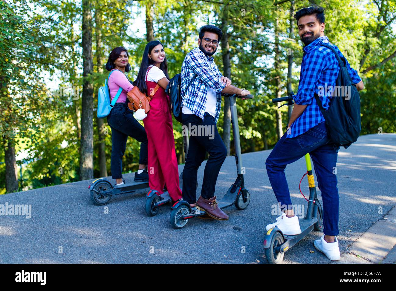 modern indian friends ride on segway in park in India Stock Photo - Alamy
