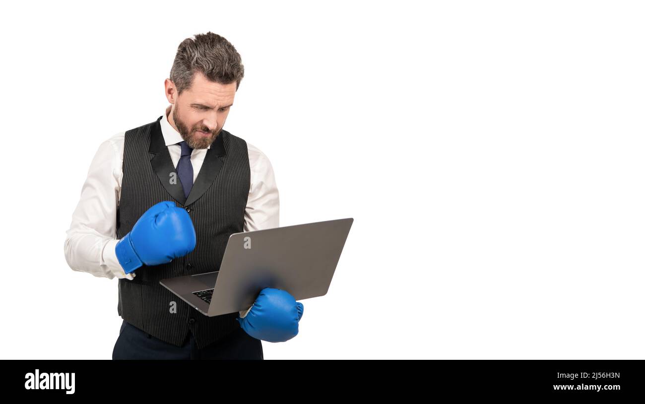 confused man boss hold laptop in boxing gloves. anger management. cyber ...