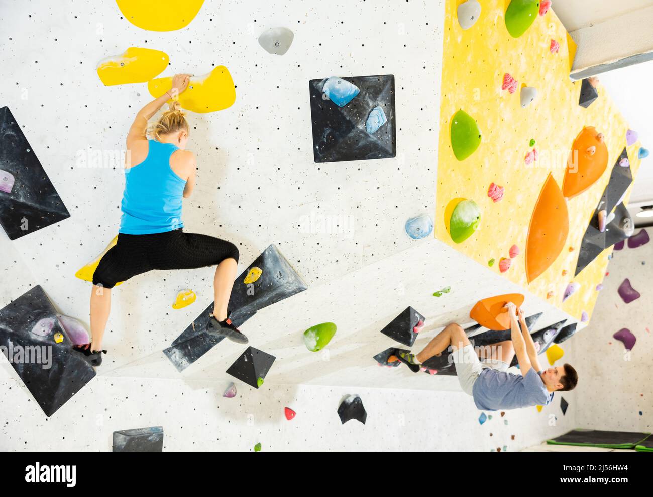 Climbing training on an artificial climbing wall indoor Stock Photo - Alamy