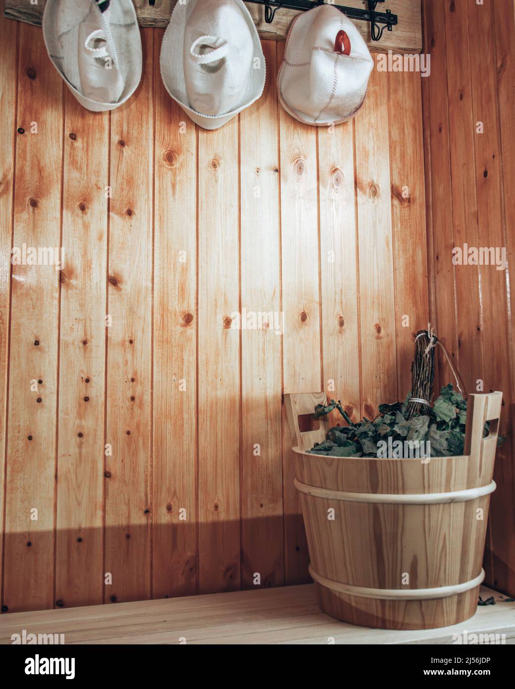 russian steam room in wood with broom and bucket Stock Photo - Alamy