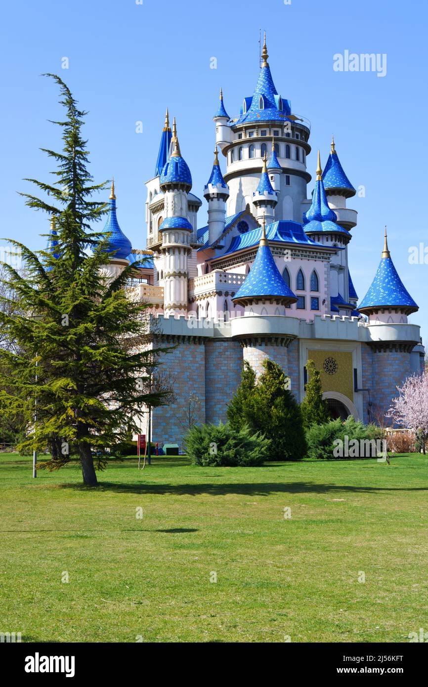 Vintage Blue castle within trees at park in a sunny spring day in ...