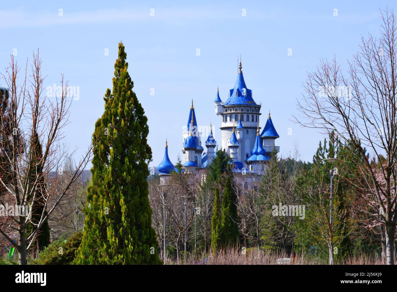 Vintage Blue castle within trees at park in a sunny spring day Stock ...