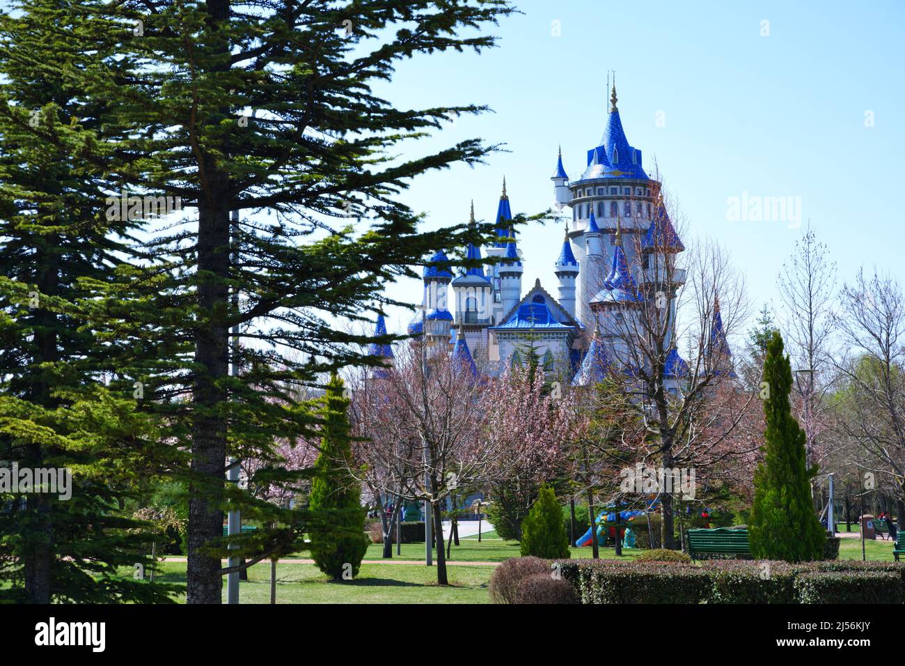 Vintage Blue castle within trees at park in a sunny spring day Stock ...