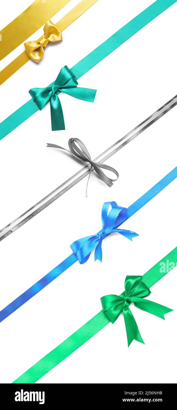Set of beautiful colorful ribbons ribbons with bows isolated on white ...