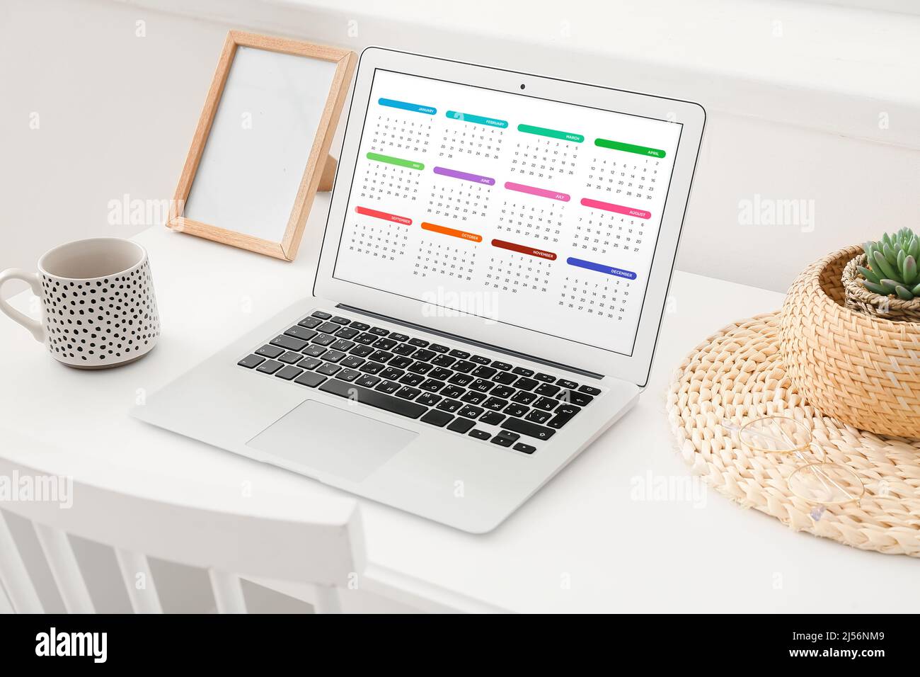 Laptop with open calendar application on screen at home Stock Photo - Alamy
