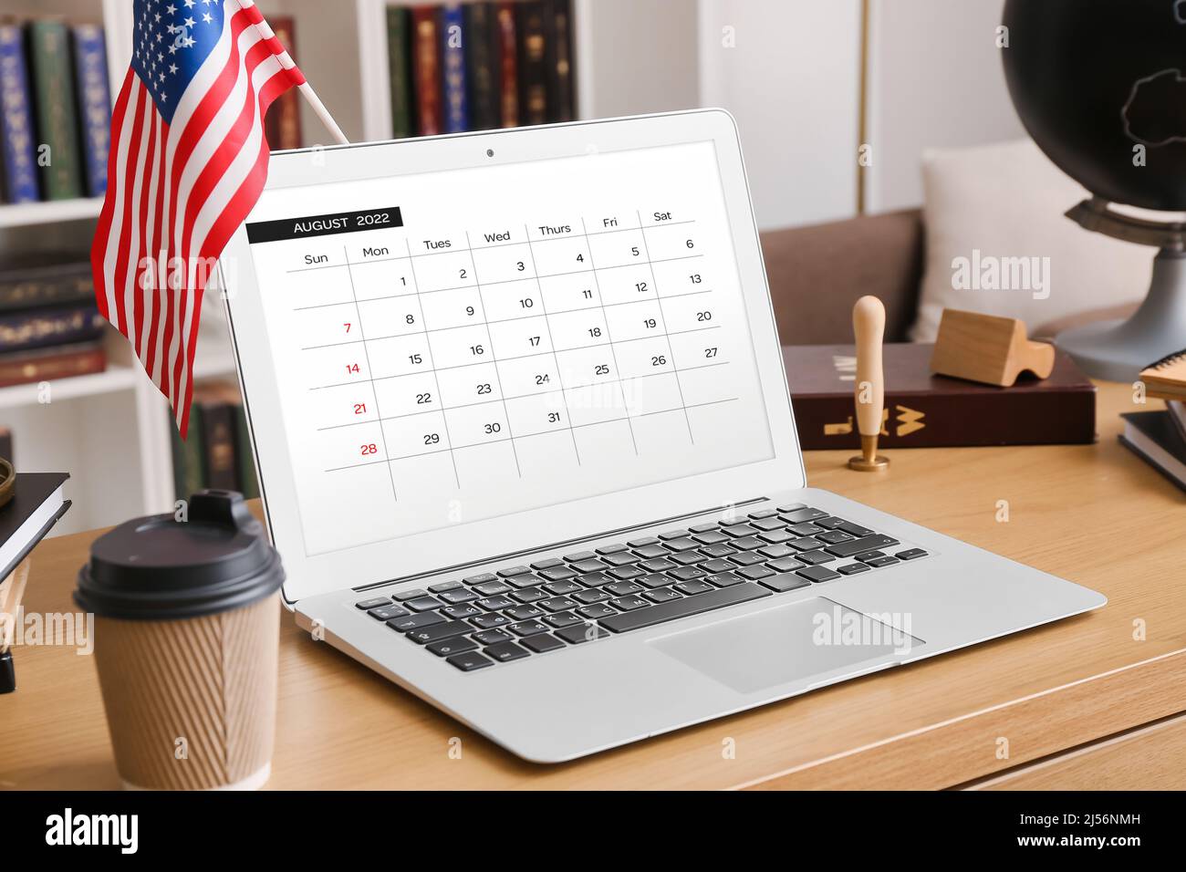 Laptop with open calendar application on screen in office Stock Photo ...