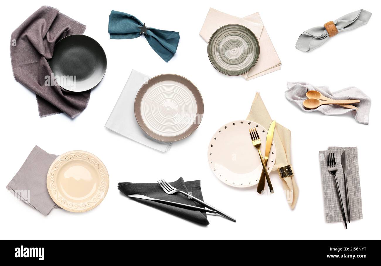 Set of simple table setting, napkins and cutlery isolated on white ...
