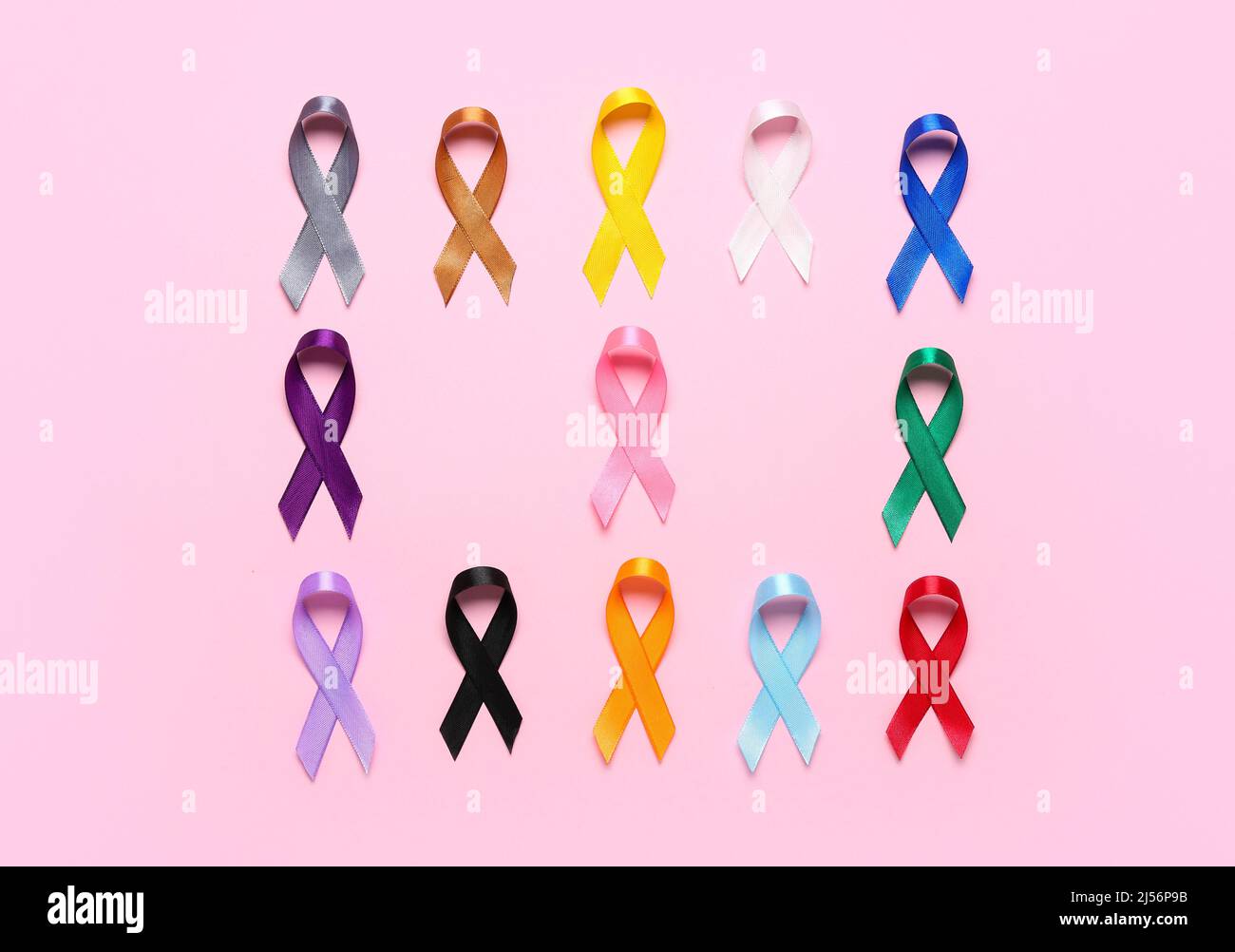 Set of awareness ribbons on pink background. World Cancer Day Stock ...