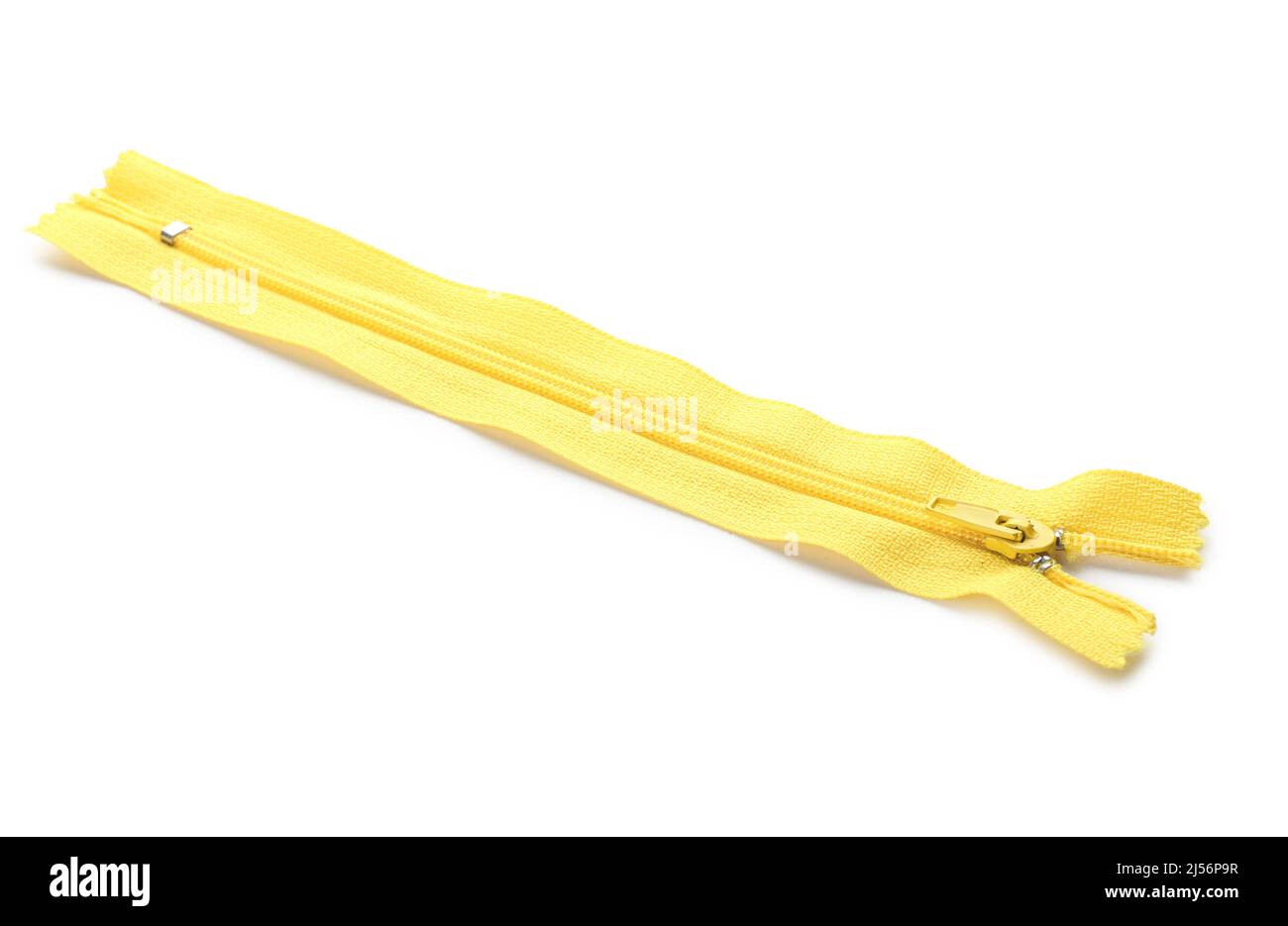 Stylish yellow zipper on white background Stock Photo - Alamy