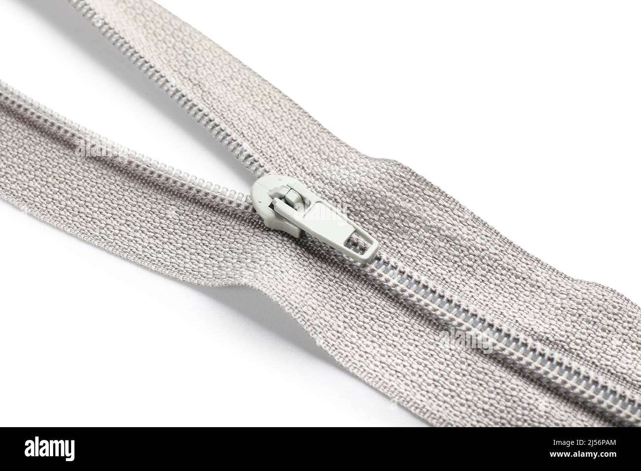 Stylish grey zipper on white background Stock Photo - Alamy