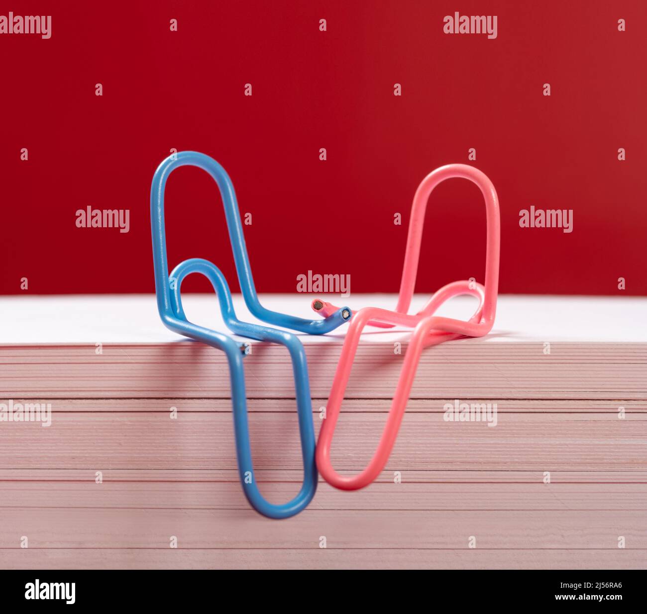 two paper clips shaped like lovers concept of valentines day Stock ...