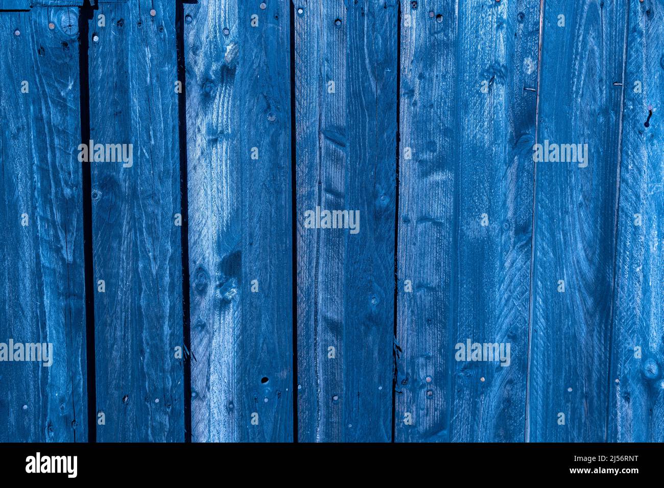 Wodden blue planks in various shades of colours, aged wodden wall of ...