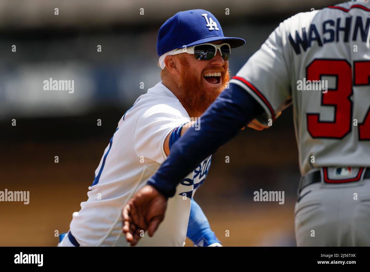 Los Angeles Dodgers third basemen Justin Turner (10) laughs during an ...
