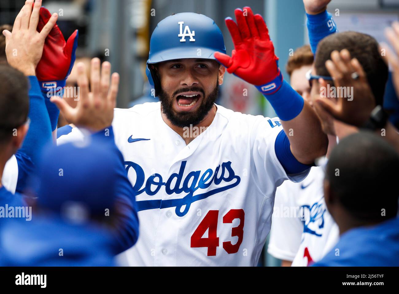 Los Angeles Dodgers designated hitter Edwin Rios (43) celebrates a home ...