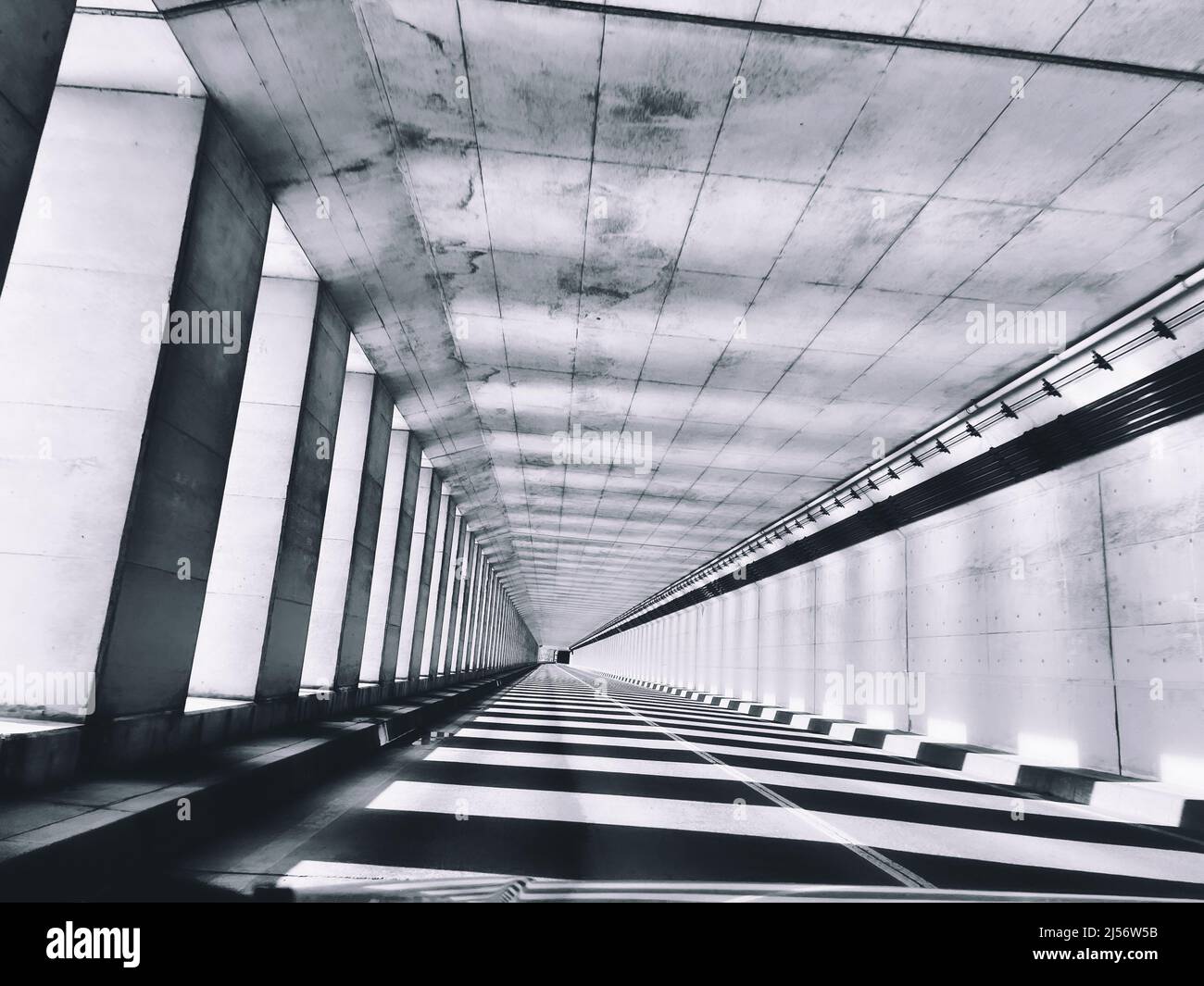 Light and shadow in a highway concrete tunnel Stock Photo - Alamy