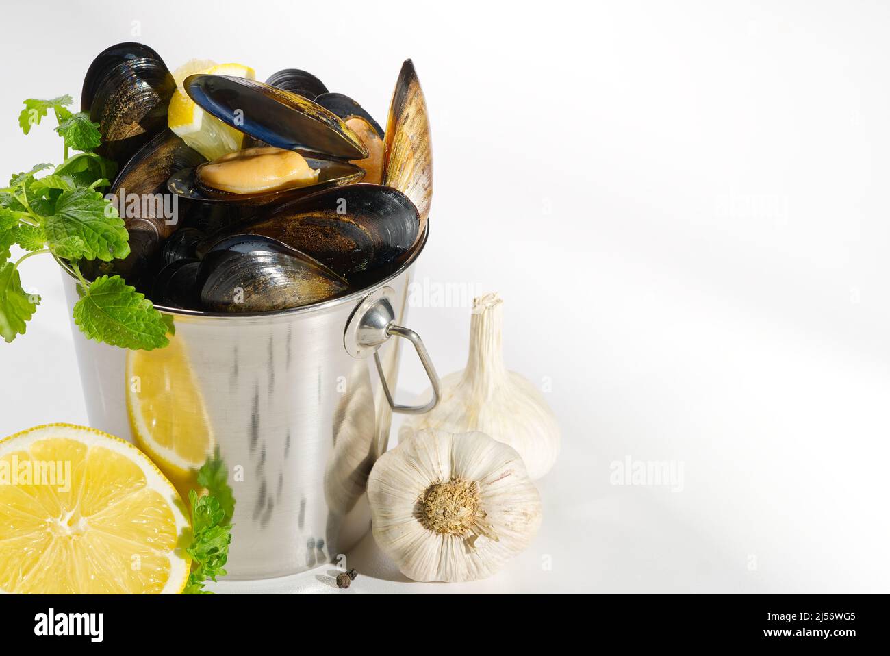 Shellfish dish. Seafood dishes. Mussels in sauce Stock Photo - Alamy
