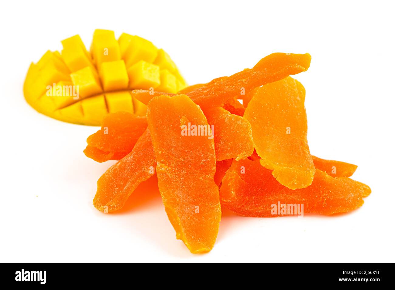 Candied Mango Strips on a White Background Stock Photo - Alamy