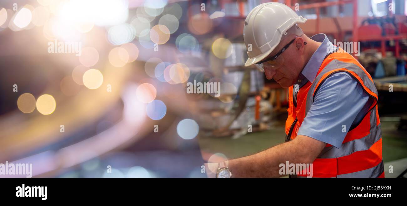 Professional worker pressing buttons on machine control board ...